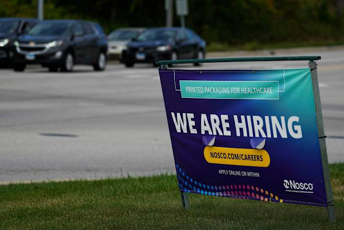 The number of Americans seeking jobless benefits falls as employers ...