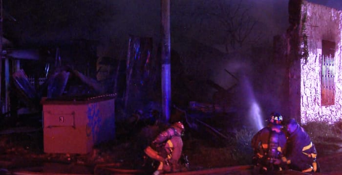 Building collapses during early morning fire near downtown, officials say