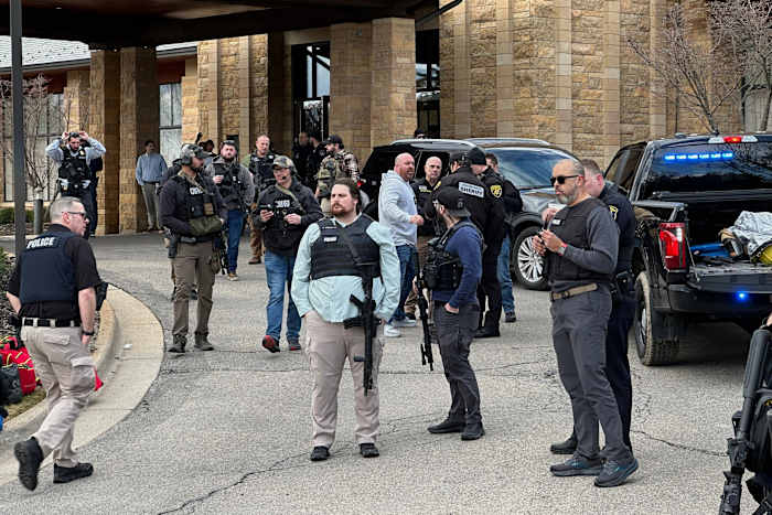 The Latest: Man fatally shot attacking Michigan synagogue