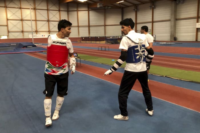 Refugee athletes deliver 'a message of perseverance' as they seek ...