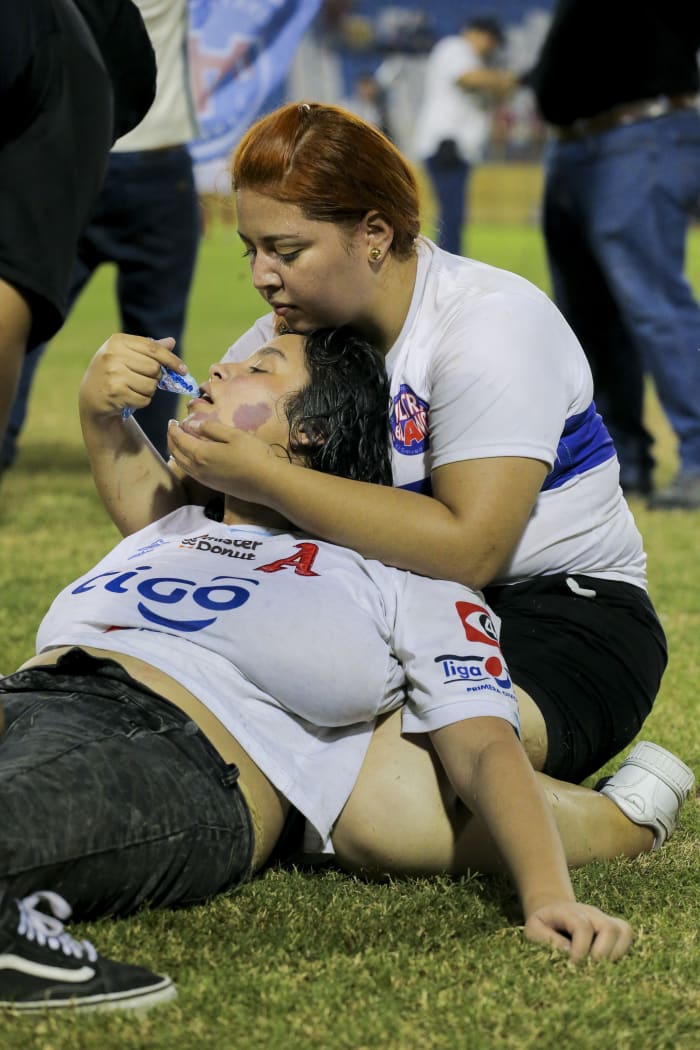 Angry fans crash through gate at El Salvador soccer match in stampede ...
