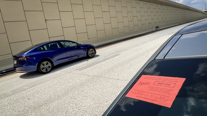 Seeing red? Those bright stickers on abandoned vehicles along side of ...