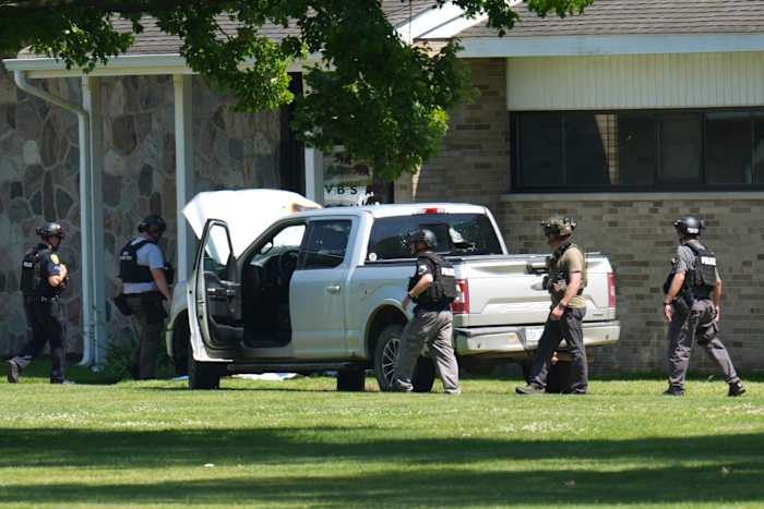 Police: Suspect shot and killed by a security guard after a shooting at ...