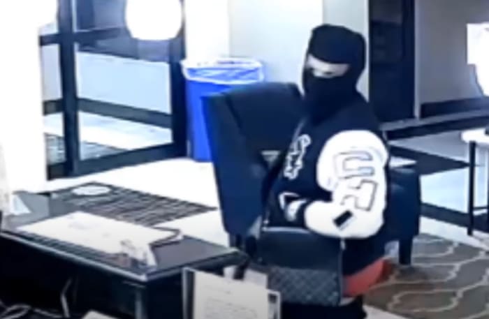 Caught on camera: Aggravated robbery suspect casually strolls into ...