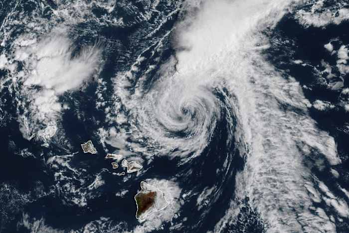 Kiko weakens into a tropical storm but brings dangerous surf to Hawaii