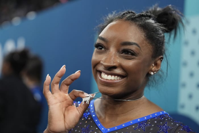 Simone Biles rocks GOAT necklace after winning gold: Here’s why