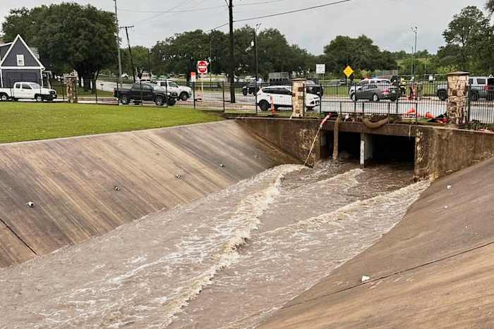 Rescue crews recover the body of a 10-year-old girl lost in Texas floods
