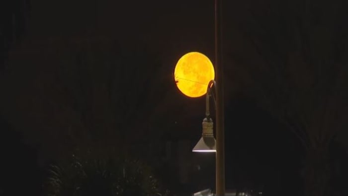 Harvest supermoon, partial lunar eclipse part of celestial trifecta ...