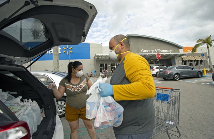 Walmart latest retailer to require customers to wear masks