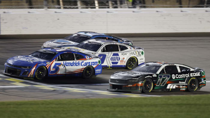 Larson edges Buescher at the line at Kansas Speedway in closest finish ...
