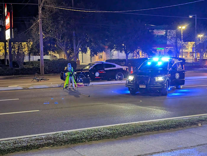 Bicyclist dies after being struck by minivan while trying to cross ...
