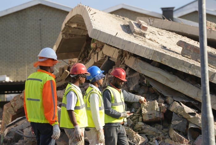 Survivors rescued but dozens still trapped after a deadly building collapse in South Africa