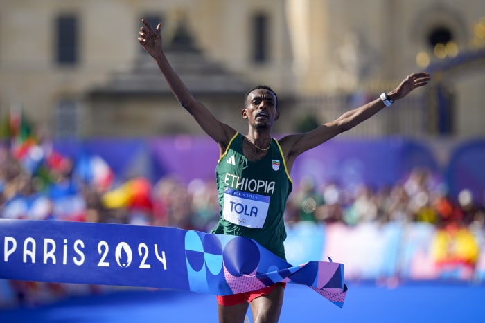 Ethiopian runner Tamirat Tola wins men's marathon at Paris Olympics to ...