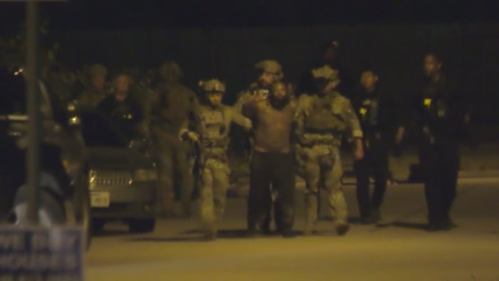 Daring standoff: Rook lifts armed officers to 2nd story of home ...