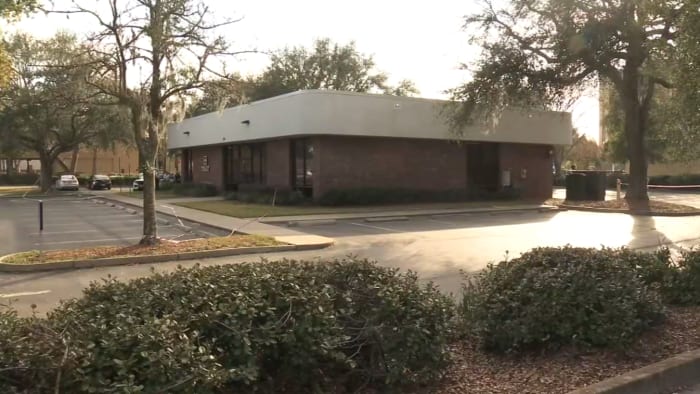 Jacksonville police seek woman after robbery at Truist bank in Regency