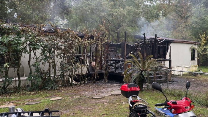 Mobile home fire leaves 1 dead; firefighter who helped pull victim from ...