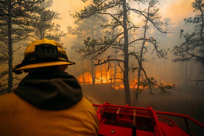 Wildfires prompt evacuations and an emergency declaration in the Carolinas