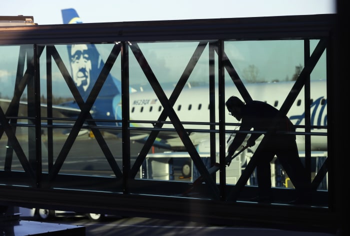 3 passengers sue Alaska Airlines after off-duty pilot accused of trying ...