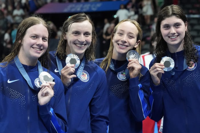 Ledecky wins record 13th medal with a silver. Summer McIntosh and Kate ...