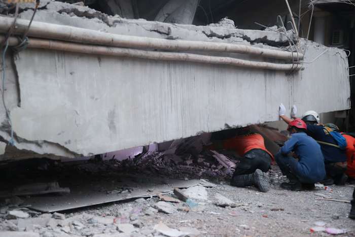 Indonesian rescuers race to find dozens of students in rubble of ...
