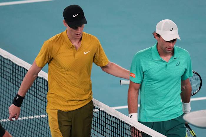 Sinner overcomes cramps, heat to continue Australian Open title defense ...
