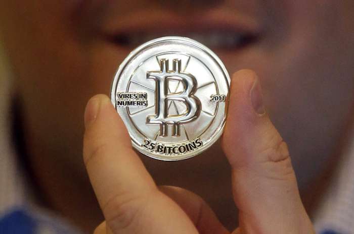 Bitcoin tops $118,000 for the first time, as the cryptocurrency ...