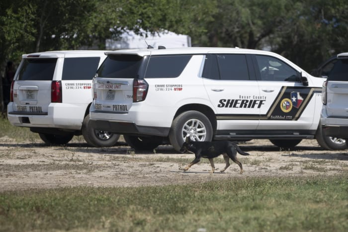Seven charged in smuggling migrants in sweltering secret compartment ...