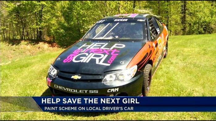 Race car driver Chad Ricker paints car with Help Save the Next Girl theme