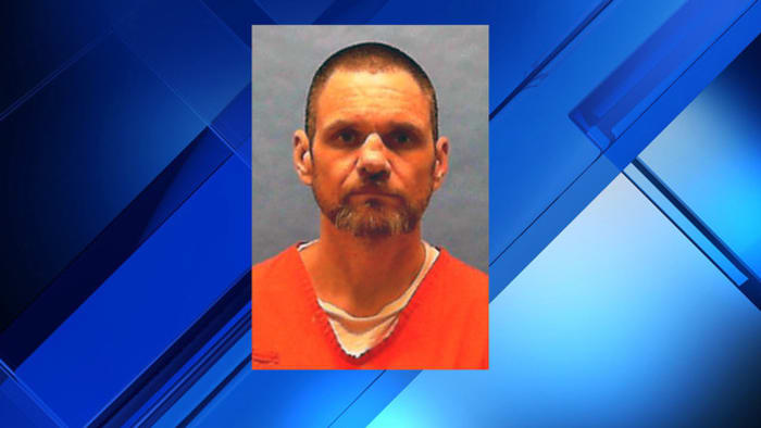 Ax murderer wants new trial; lawyers point finger at victim's son