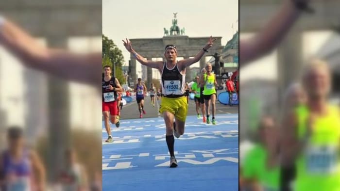 Marathon runner helps chase down men involved in hit-and-run in stolen SUV