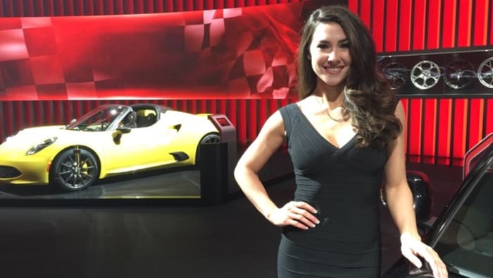 Detroit auto show spokesmodels decorate floor of Cobo Center