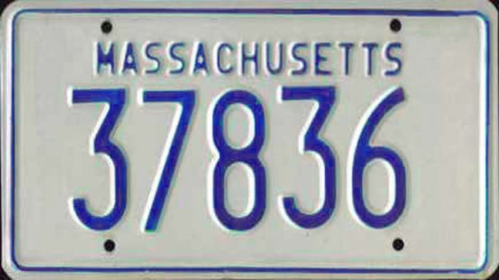 Man makes homemade license plates from pizza box