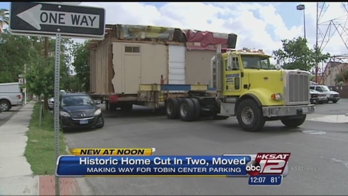 Historic home moved to make room for new Tobin Center parking lot