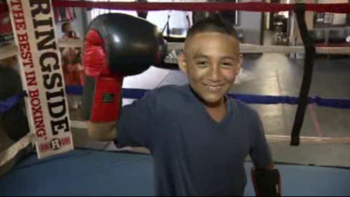 8-year-old, partially deaf boxer packs punch at Detroit's Downtown ...