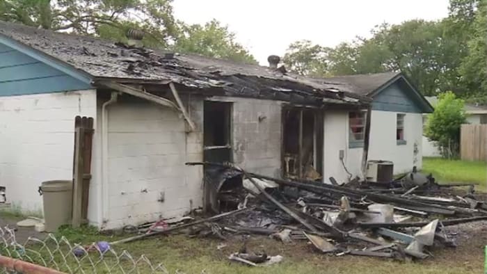 Propane tank explodes, fire destroys home