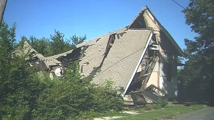 Neighbors relieved after collapsing house demolished in Detroit