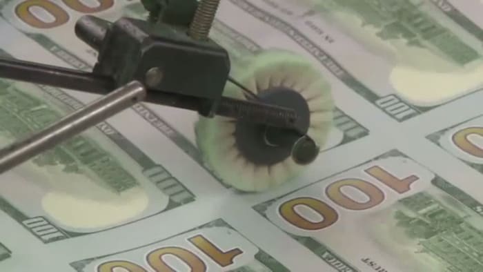 Artist sentenced in counterfeit money scheme