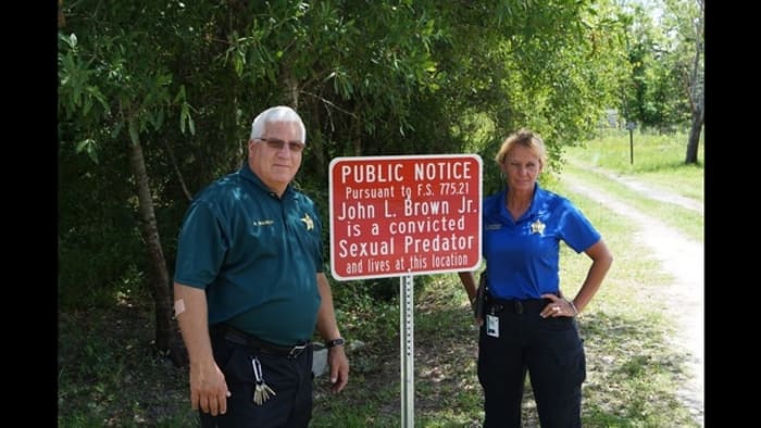 Community split on sexual predator signs