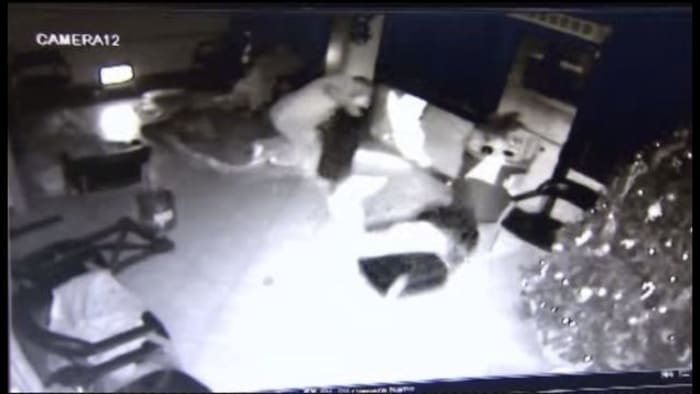 Caught on camera: Tire smashes through window, hits man