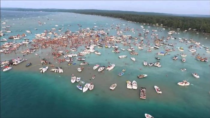 Nonprofit seeks to block Torch Lake sandbar parties