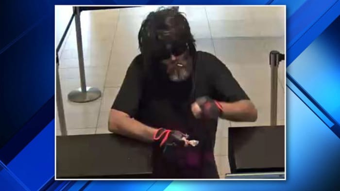 Man who wore wig during Houston bank robbery sought