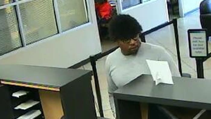 Wig-wearing bank robber sought in Ocala