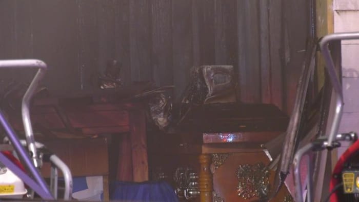 Video shows fire-damaged caskets after blaze at old funeral home