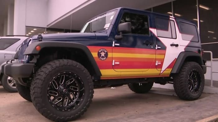 Astros-themed Jeep on display at west Houston dealership
