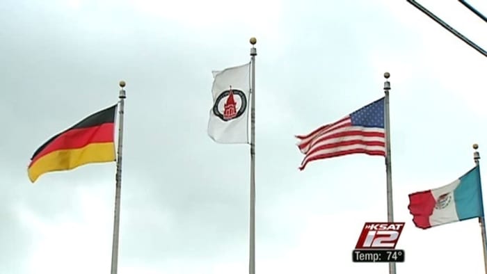 Veteran upset UIW banner flies above US flag