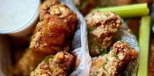 Wags Food & Culture Delivery Menu | Order Online | 1601 Plaza Dr ...