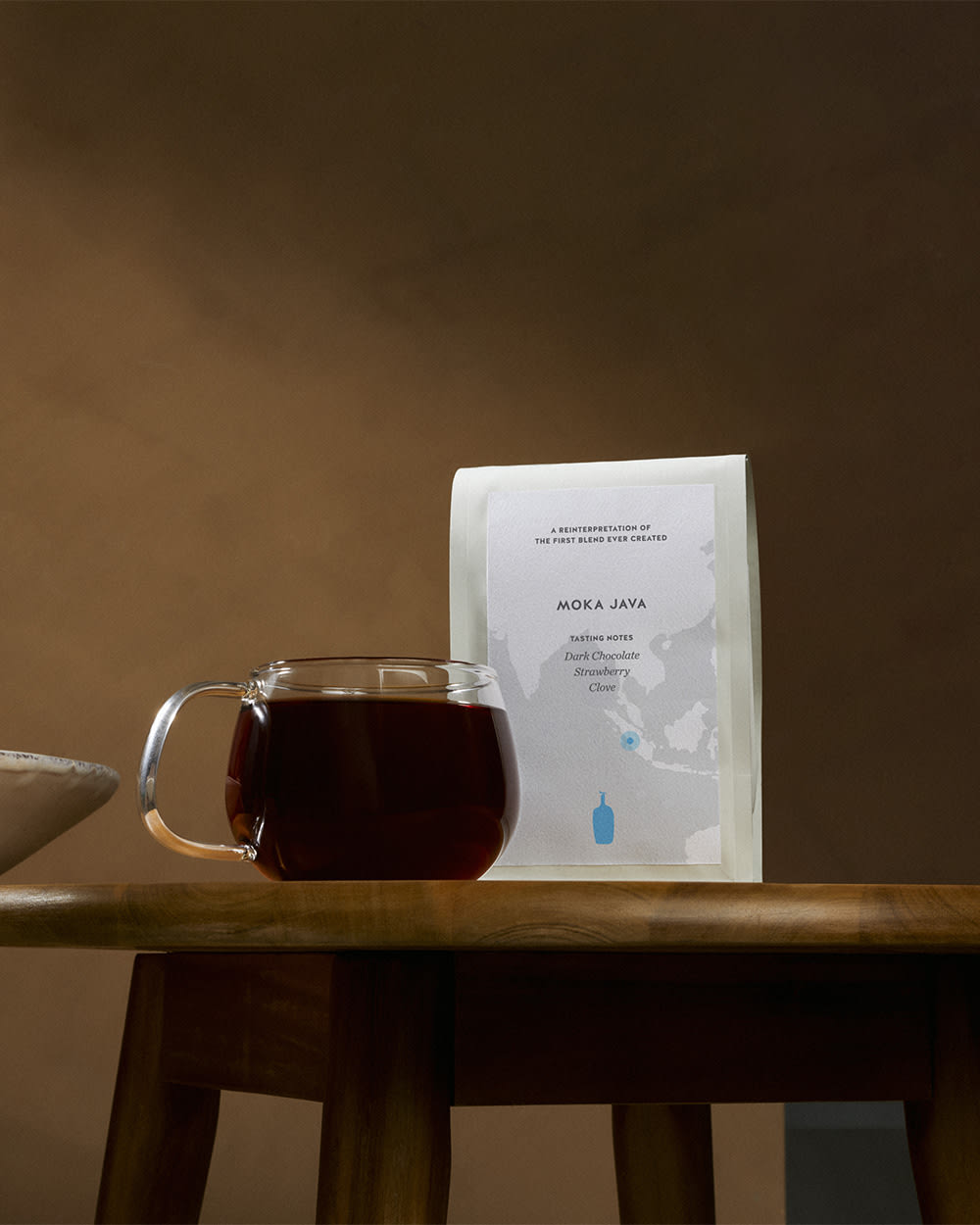 Image of a cup of prepared Moka Java blend coffee in a glass Kinto cup ...