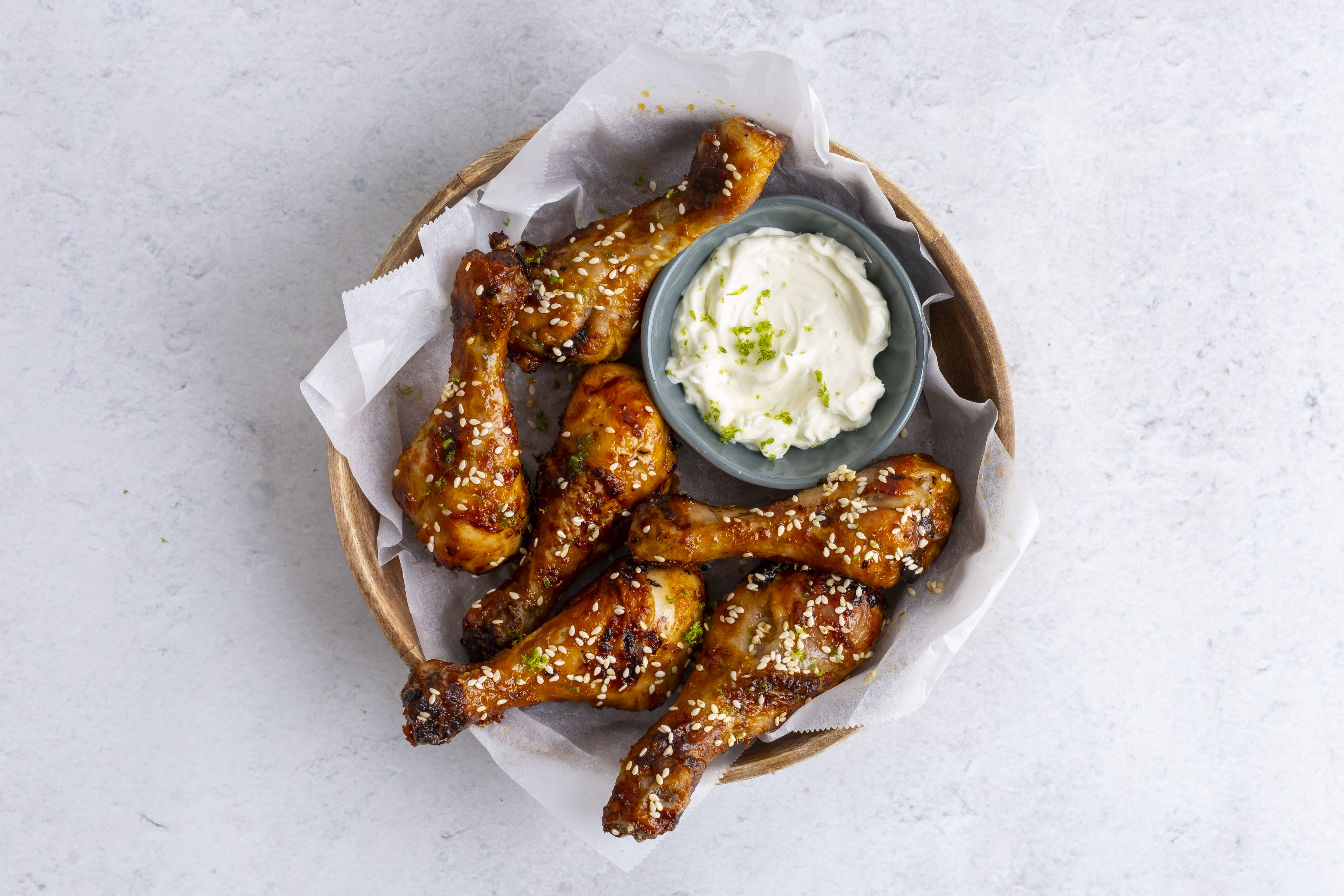 Sweet and Spicy Gochujang Chicken Drumsticks with Zesty Lime Crema ...
