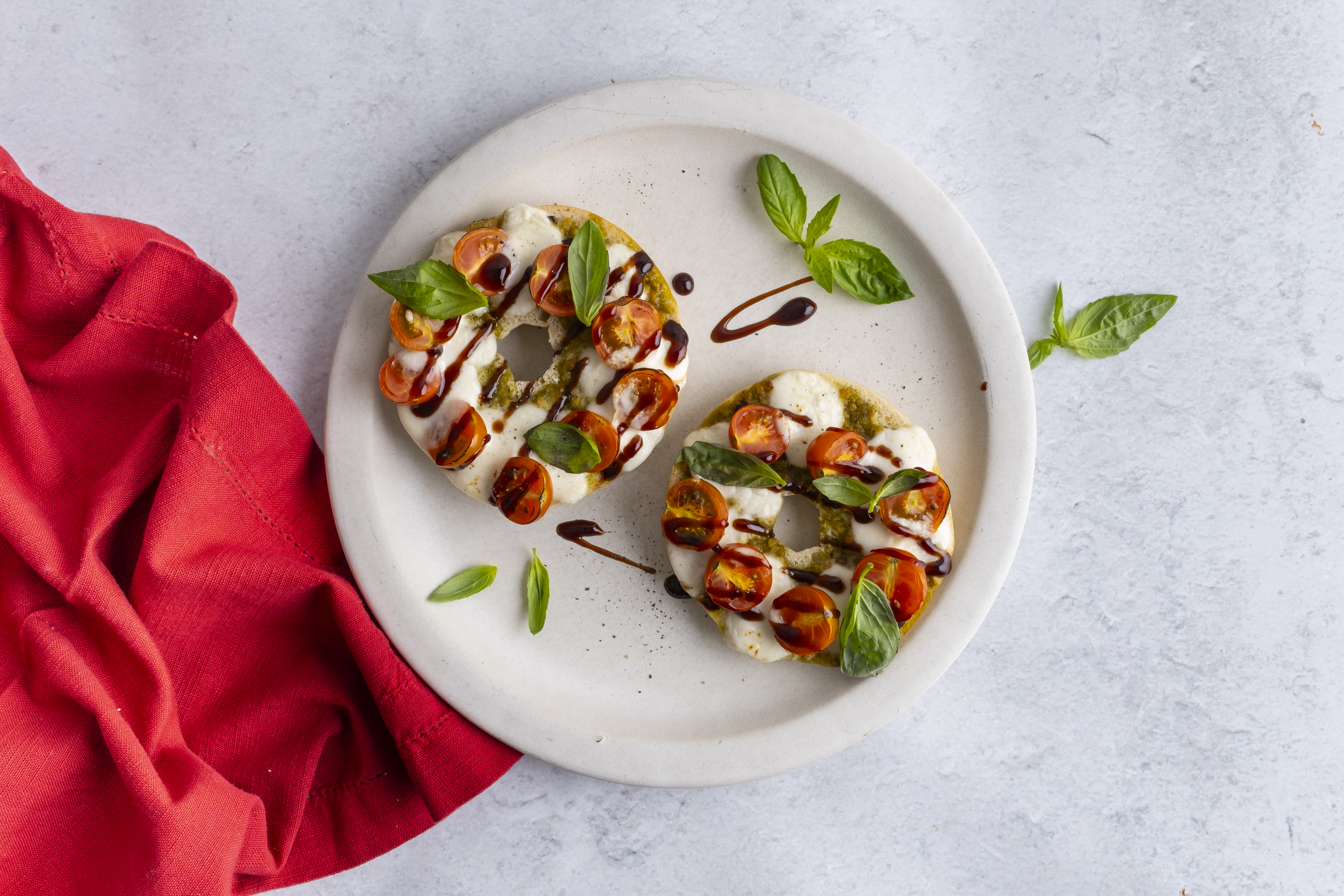 Caprese Bagel with Pesto, Fresh Mozzarella, Tomato and Balsamic Glaze | Hello Chef!