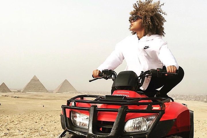Quad Bike Trip during sunset around Pyramids, evening attend the sound & light show at Giza ...